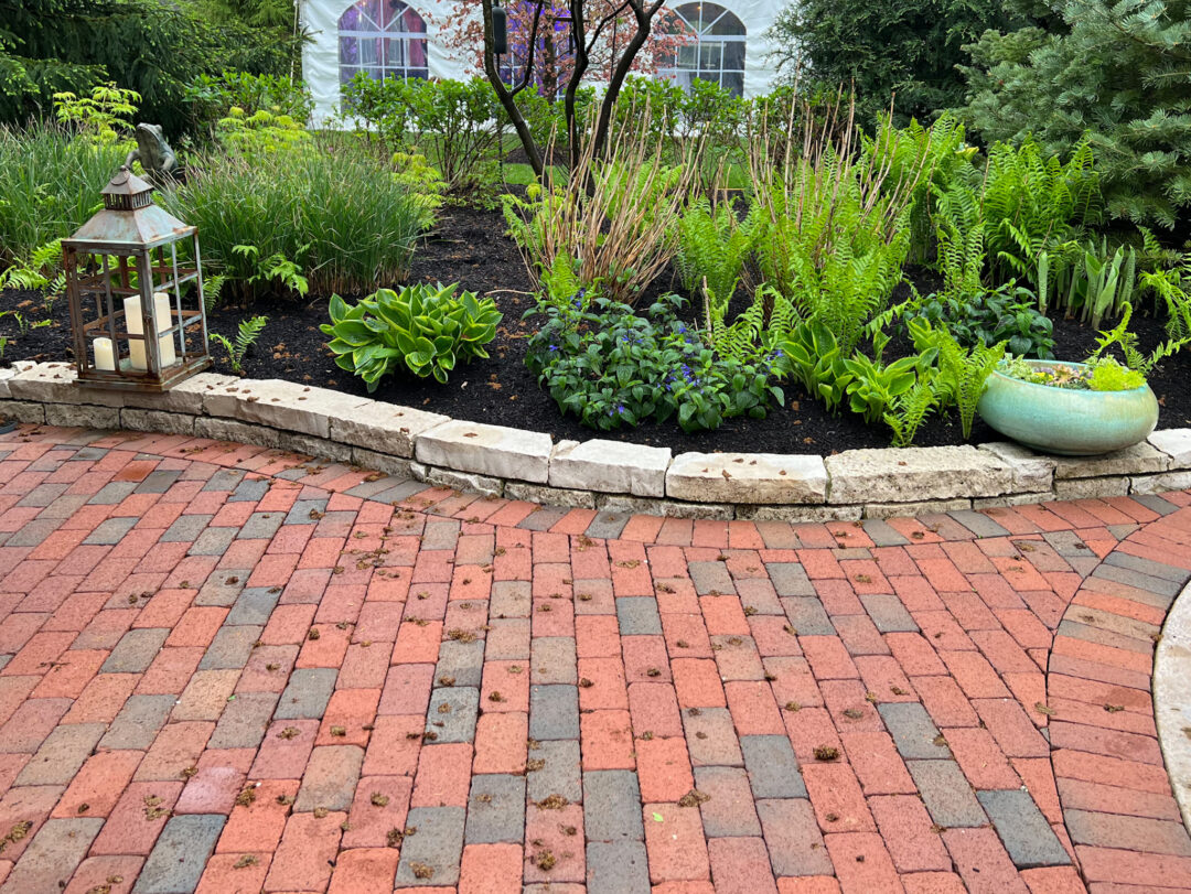 How to Install Brick Edging Around a Patio - Building Bluebird