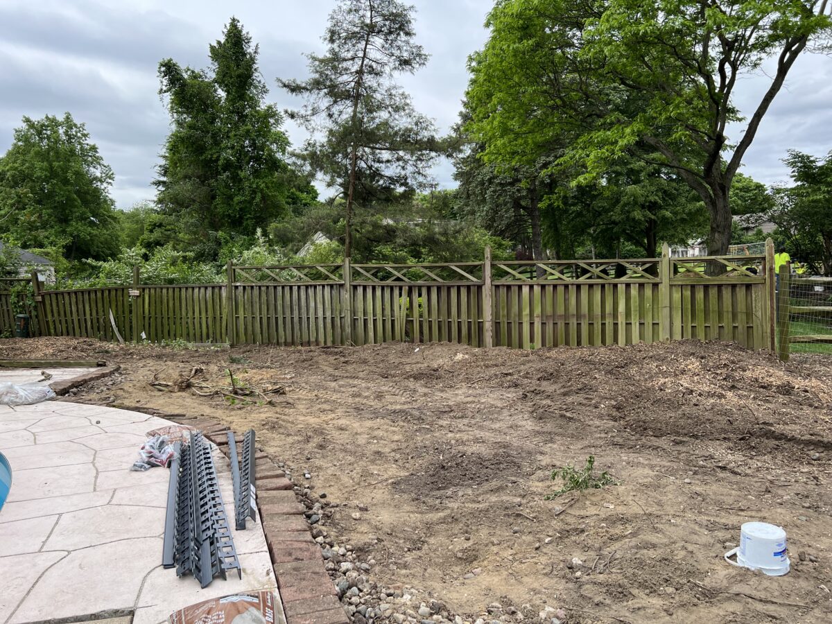 How to Install Brick Edging Around a Patio - Building Bluebird