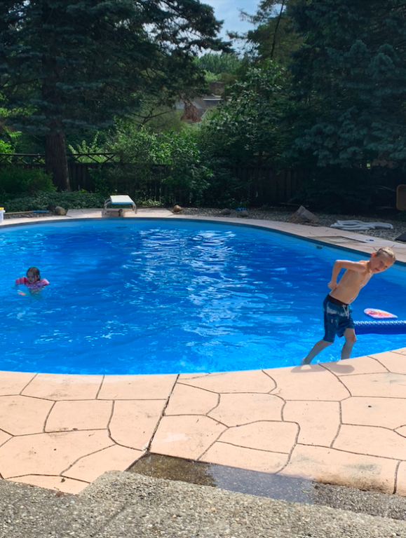 How to Install Brick Edging Around a Patio - Building Bluebird