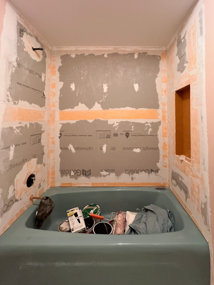 Easily Tile Your Shower Walls With This DIY Tutorial - Building Bluebird