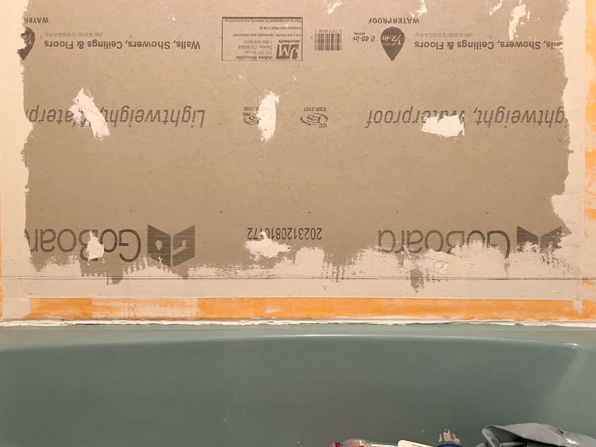 Easily Tile Your Shower Walls With This DIY Tutorial - Building Bluebird
