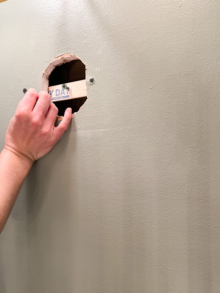 How to Patch a Drywall Hole Using a Paint Stick - Building Bluebird
